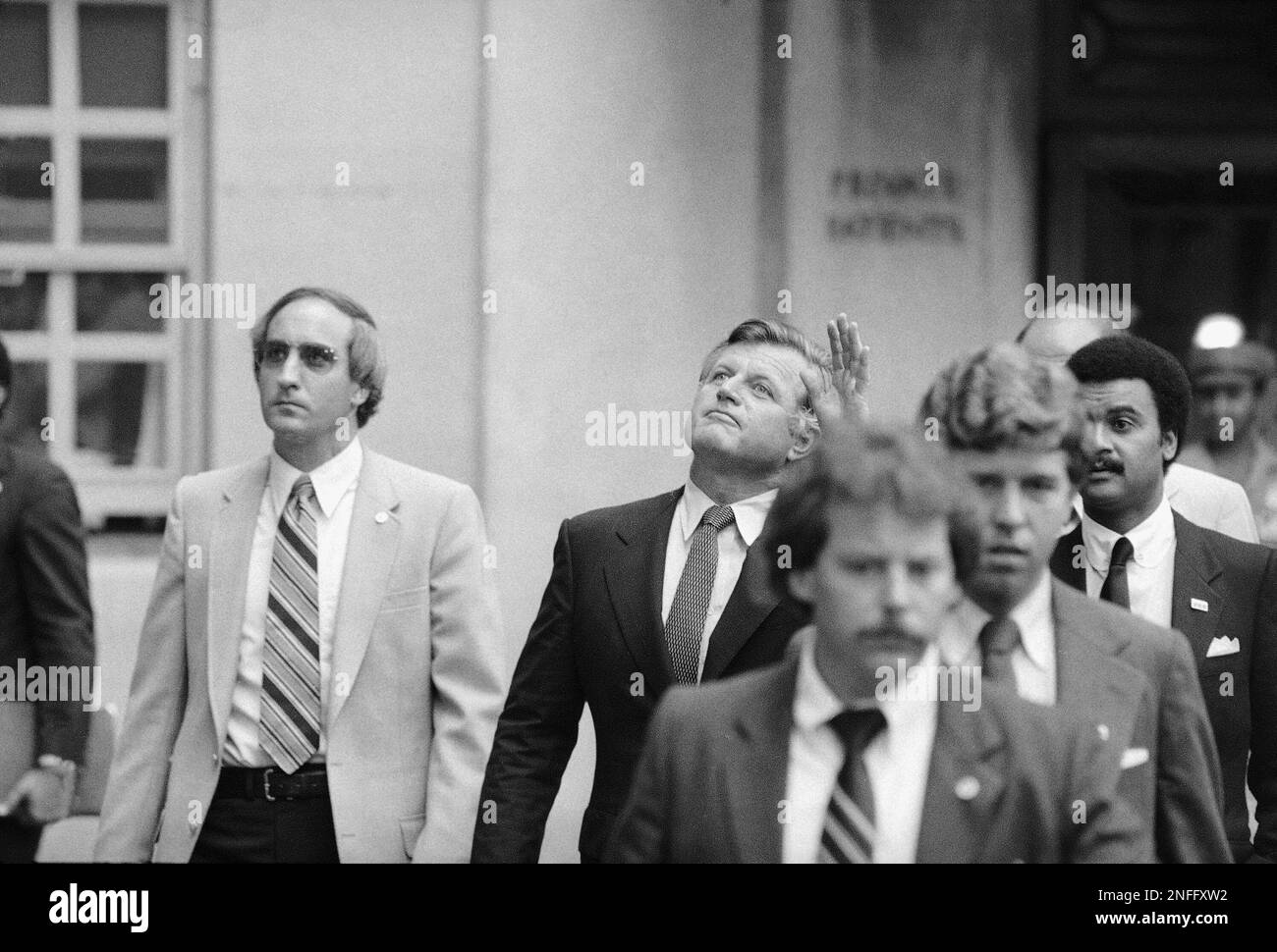 Presidential candidate Edward Kennedy, center, is surrounded by ...