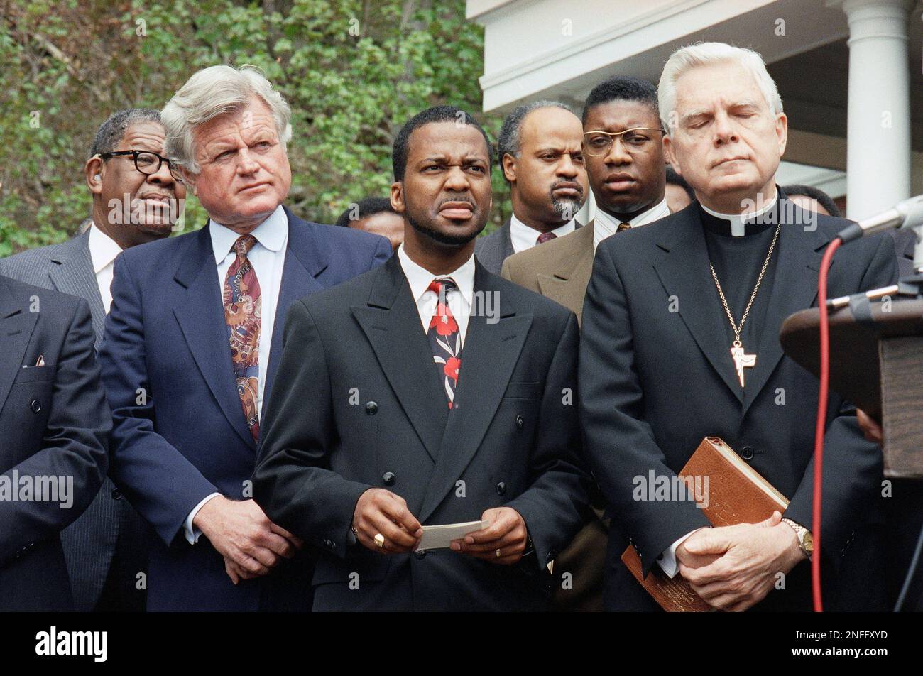Sen. Edward Kennedy, second from left, Rev. John Borders III, center ...