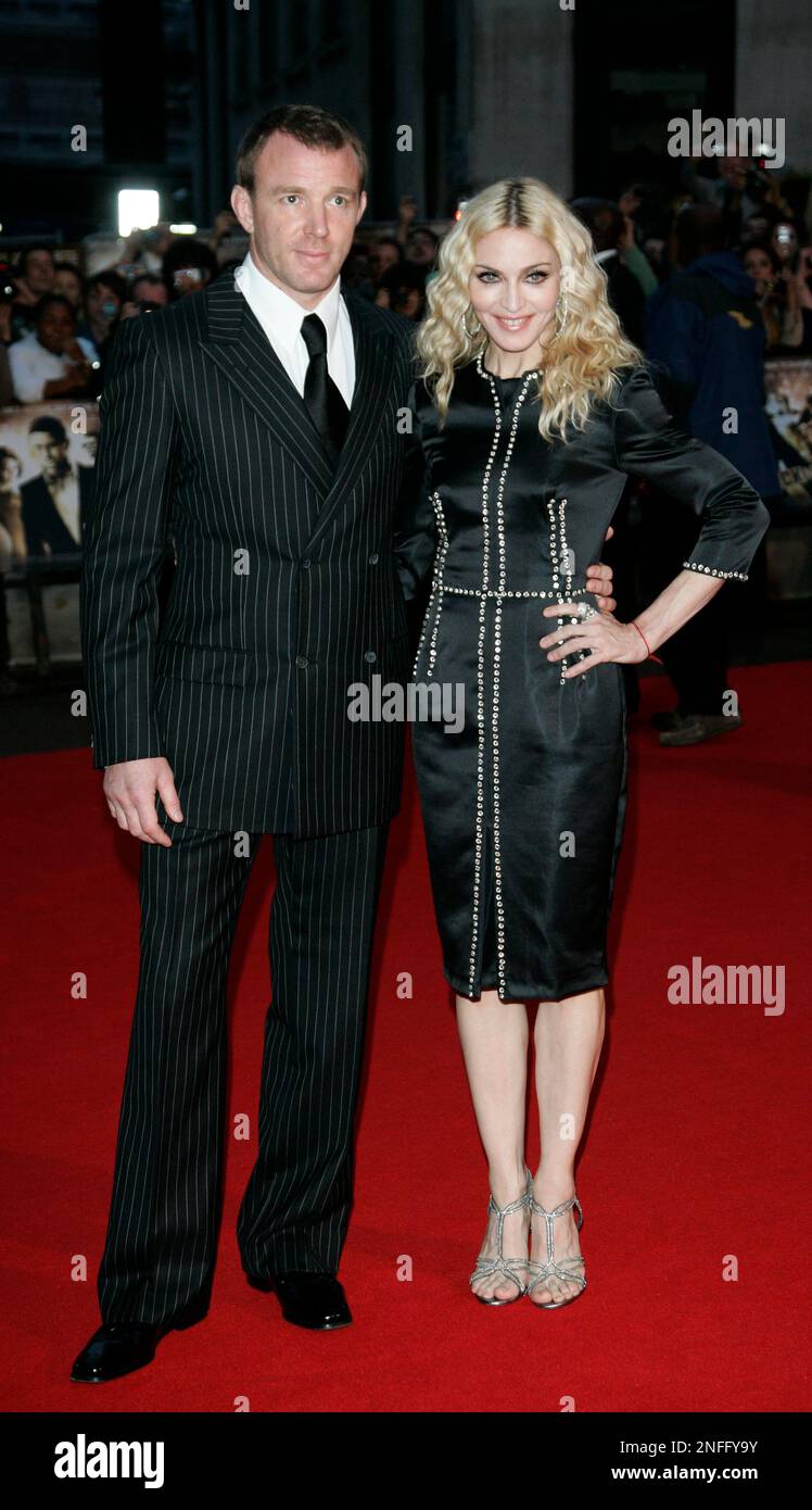 British director Guy Ritchie, left, and his wife Madonna arrive for the ...