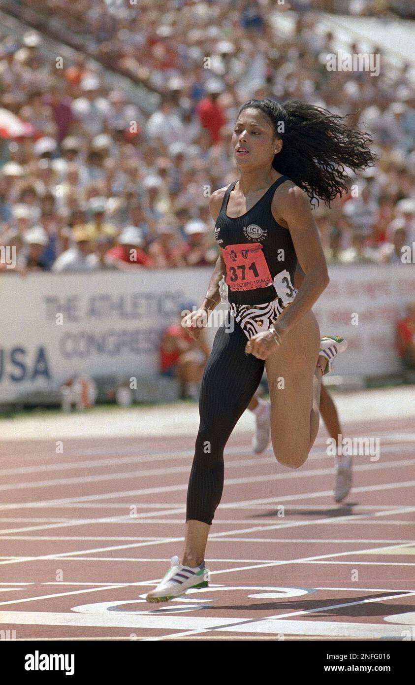 Athlete Florence Griffith Joyner runs in a preliminary heat of the ...