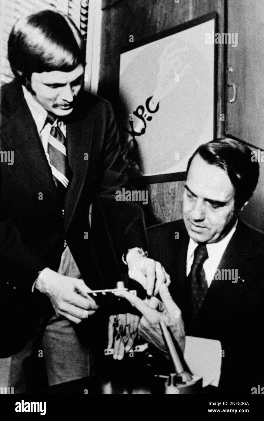 Sen. Robert Dole (R-Kan) has his right hand strapped into an electric ...