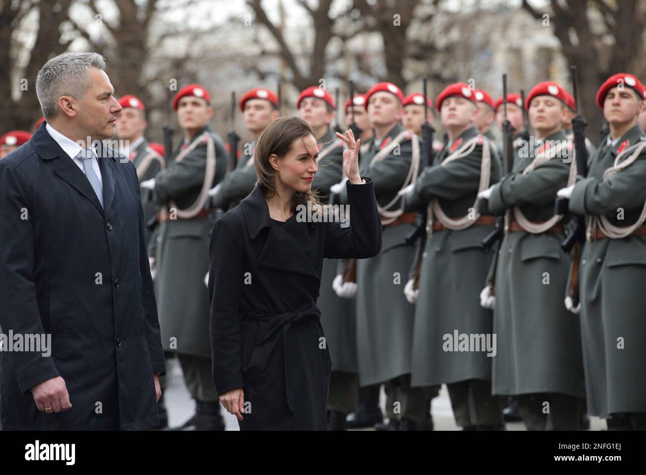 Austria's Chancellor Karl Nehammer, left, welcomes Finland's Prime Minister Sanna Marin, right ...