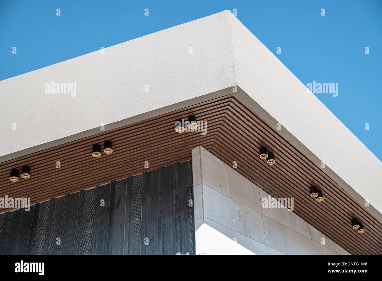 PVC ceiling panel covered with wood-like vinyl with modern lighting ...