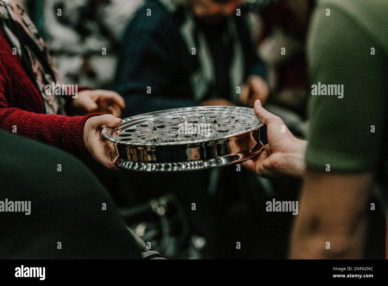 Communion with bread and wine during the service in the assembly Stock ...