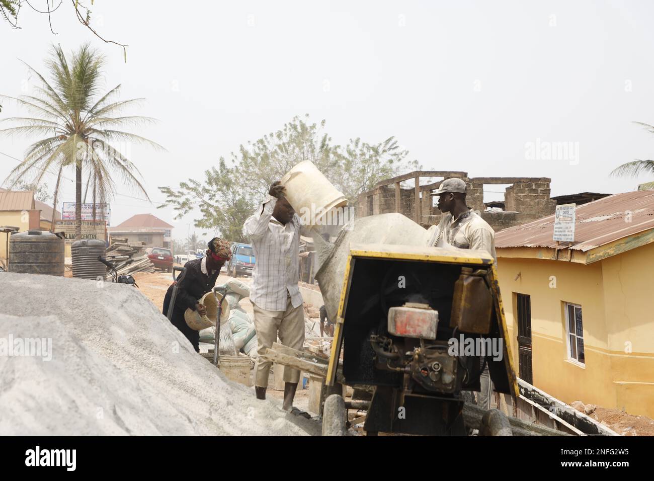 Building the Future: Men at Work Stock Photo - Alamy