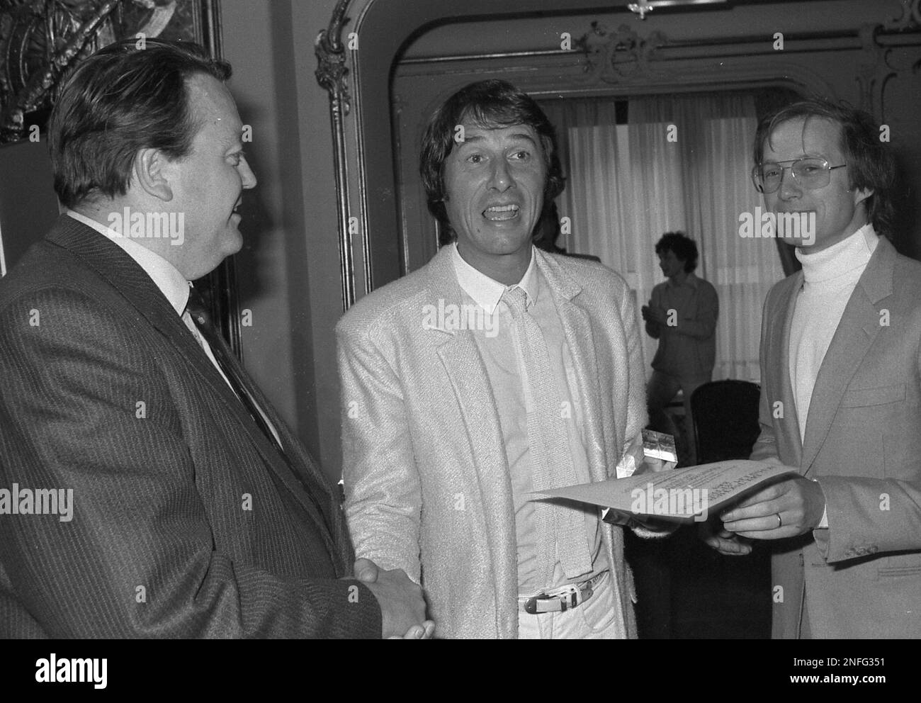 Austrian singer - composer Udo Juergens, center, receives the German ...