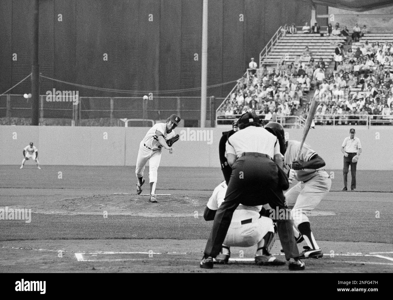 Los Angeles Dodgers pitcher Don Sutton, left, follows through as he ...