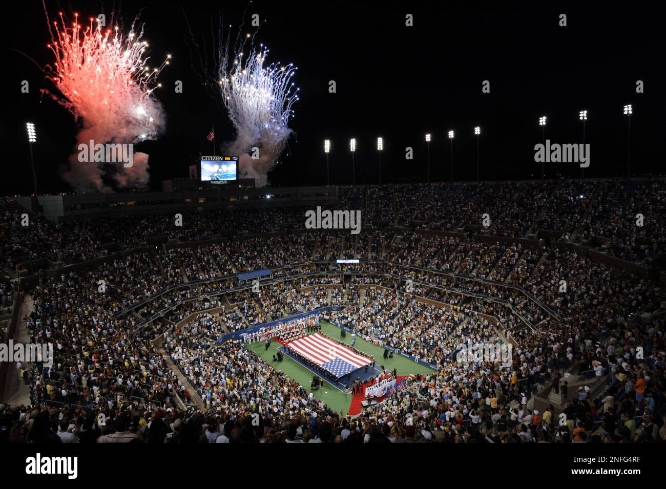 Fireworks explode over Arthur Ashe Stadium during opening ceremonies ...