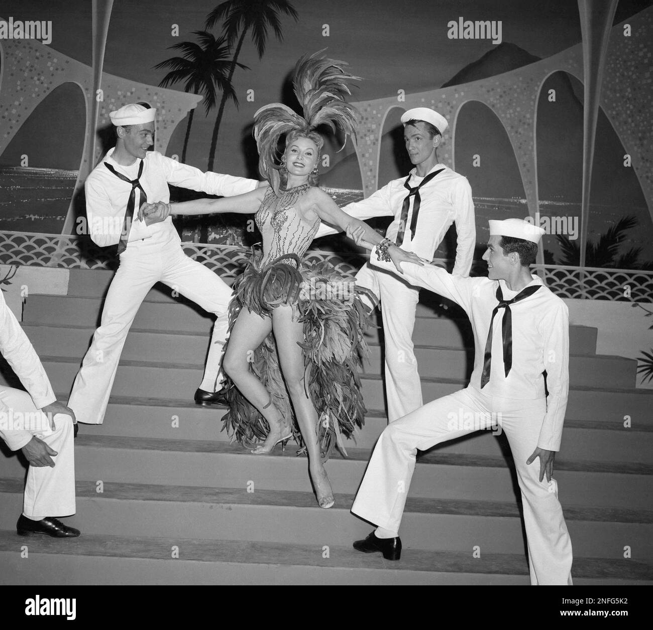 Rhonda Fleming blossoms out as a singer and dancer in the first night ...