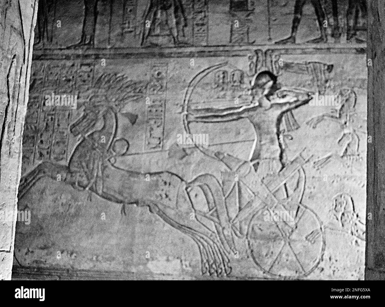 A relief in the hall of the pillars of Ramses's temple show on chariot ...