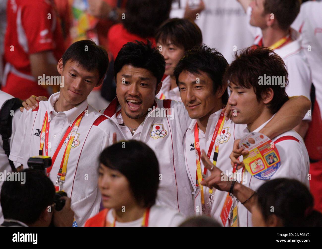 Japanese competitors gather during the closing ceremony for the Beijing ...