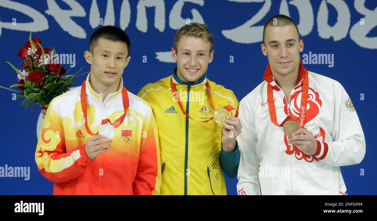 Gold Medallist Australia's Matthew Mitcham, center,, China's Liang Huo ...