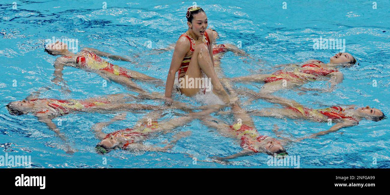 China's synchronized swim team performs in the final of the team free ...