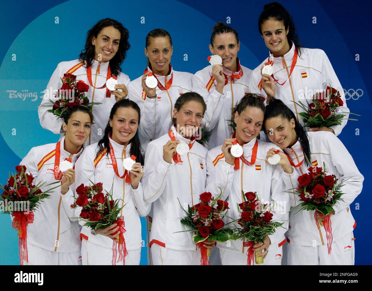 The Spanish synchronized swim team poses with their silver medals for ...