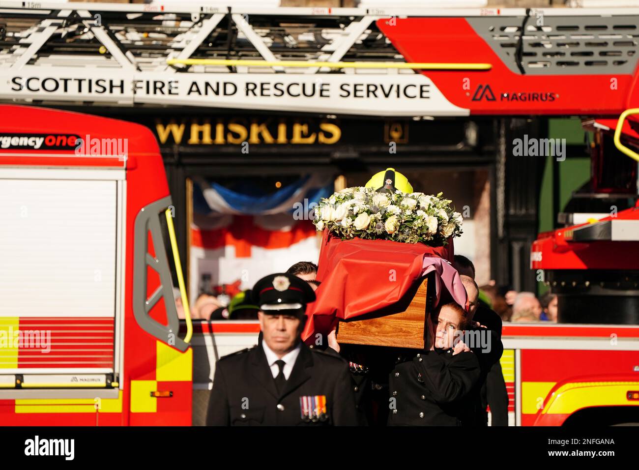 The coffin of Barry Martin is carried into St Giles' Cathedral in ...