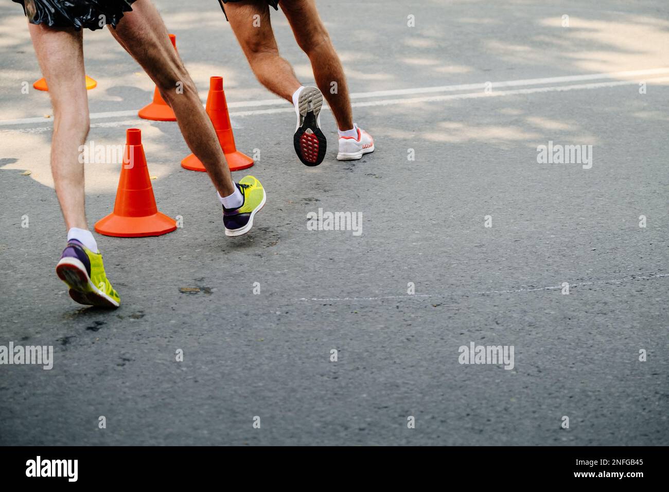 legs two male athletes racewalking in athletics competition Stock Photo ...