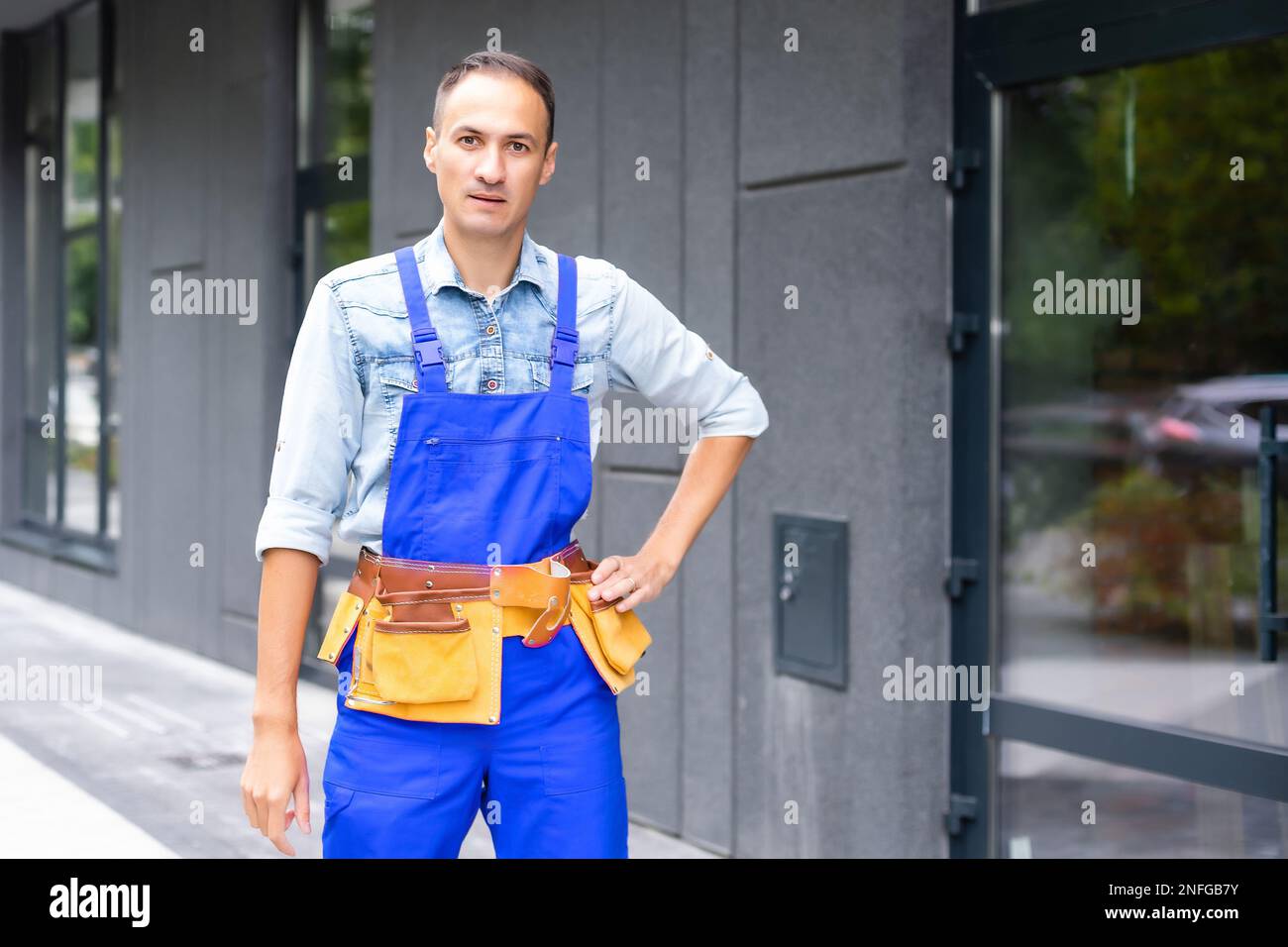 worker and professional builder with tools Stock Photo - Alamy