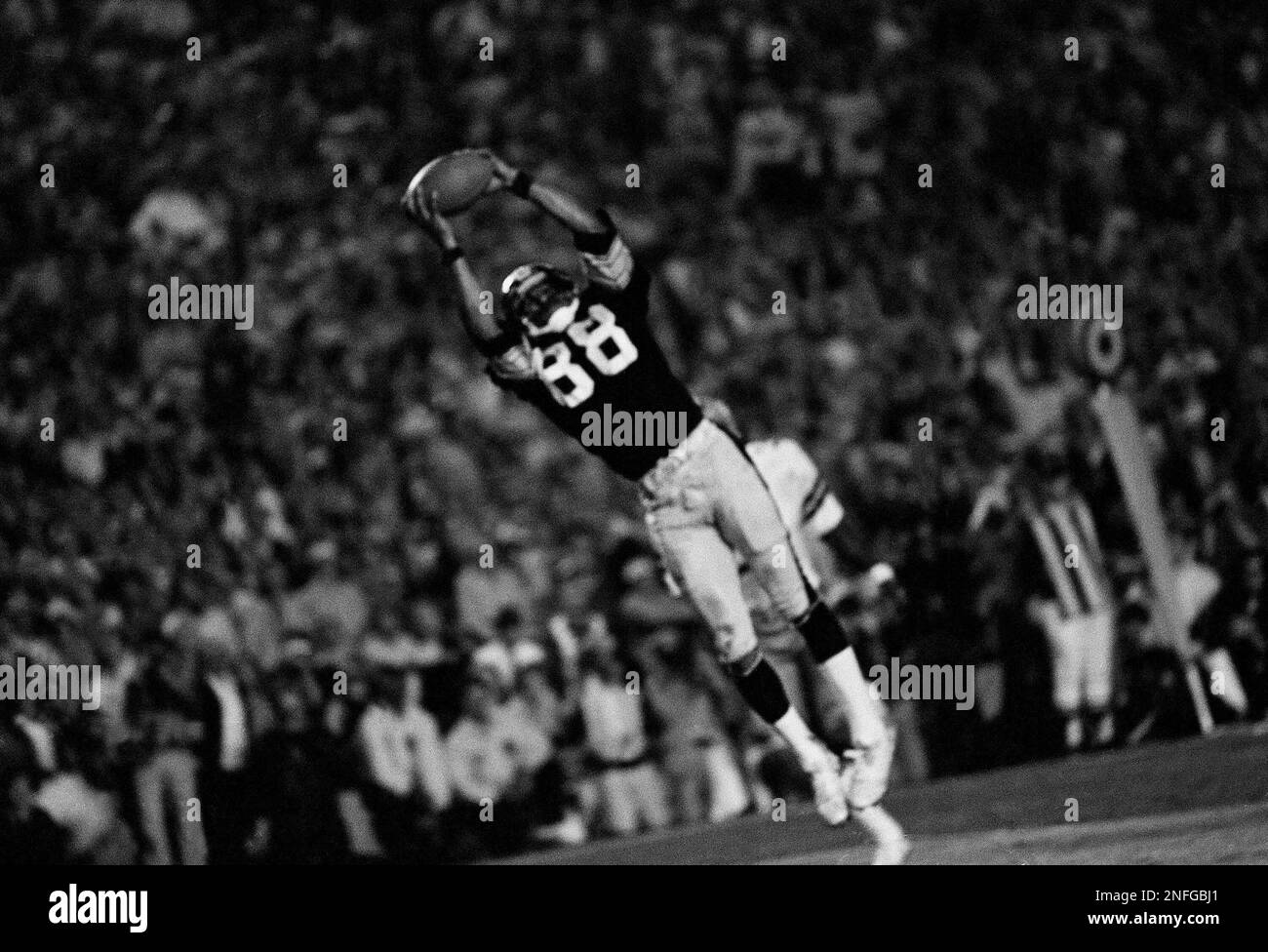 Pittsburgh Steelers wide receiver Lynn Swann goes high to take in a pass from quarterback Terry ...