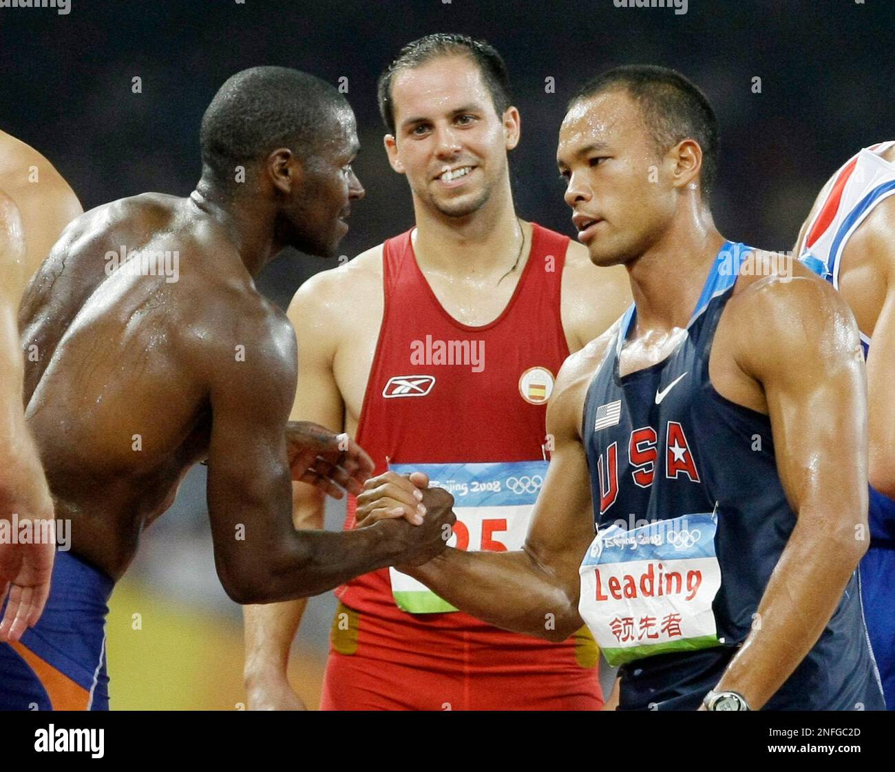 Bryan Clay of United States, right, is congratulated by Netherlands ...