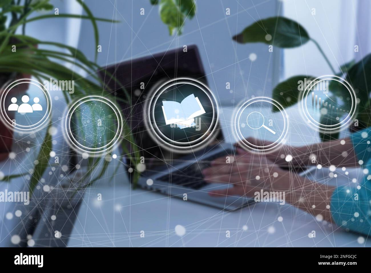 laptop computer and tablet in modern office with virtual icon diagram ...