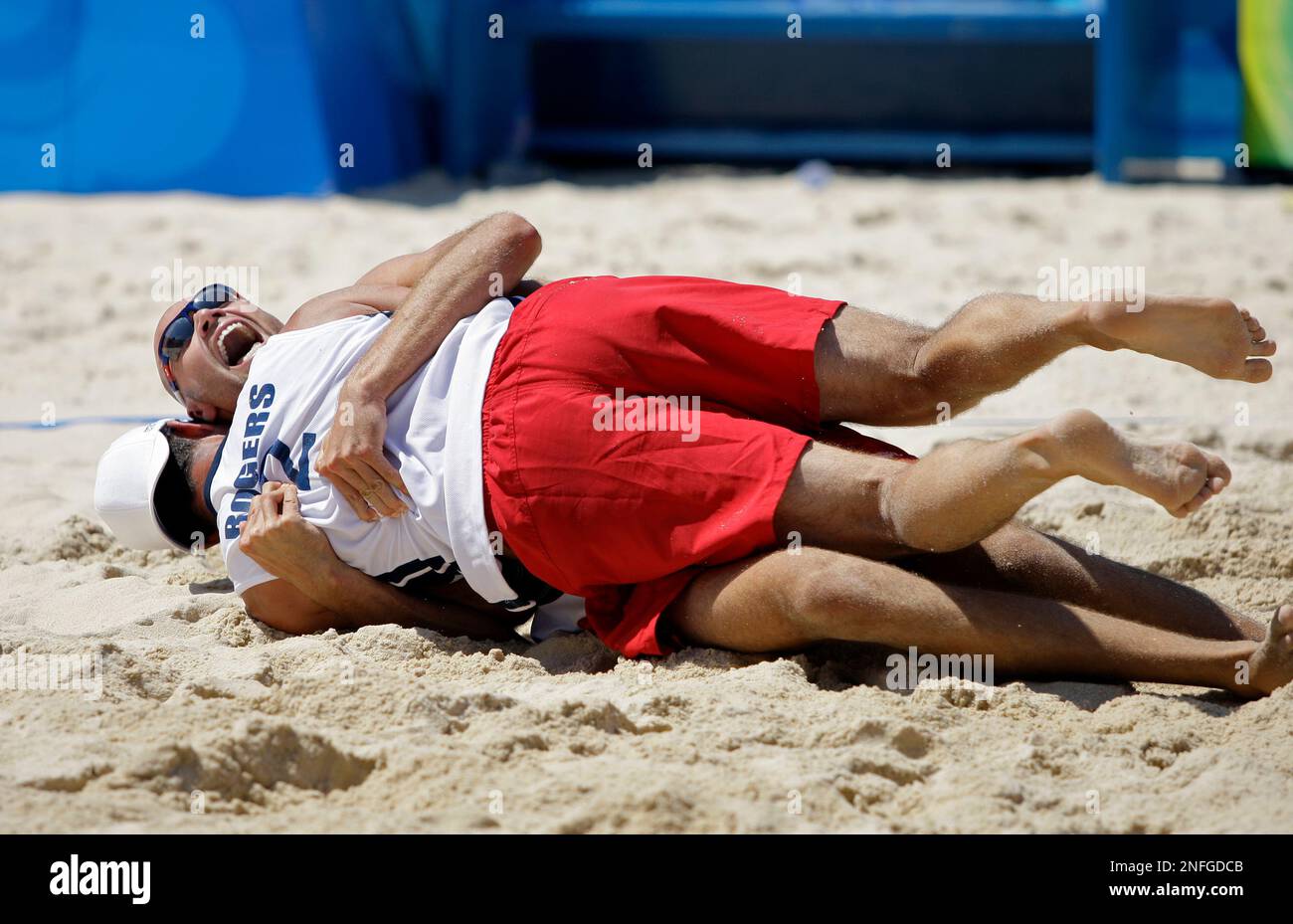 U.S.'s Philip Dalhausser, above, and Todd Rogers celebrate winning the ...