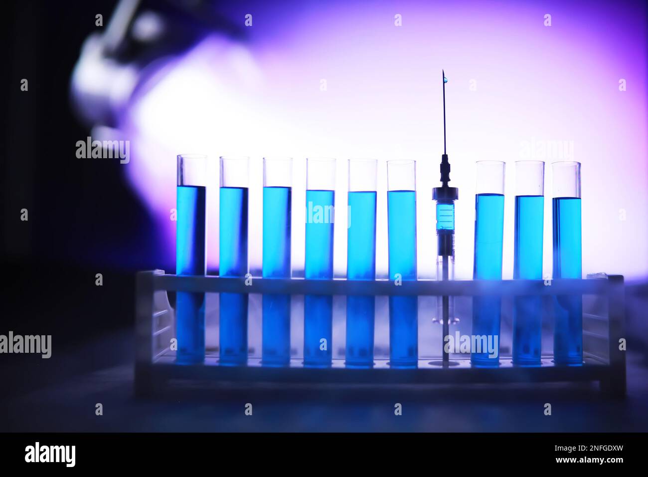 Test tube of glass overflows new liquid solution potassium blue ...