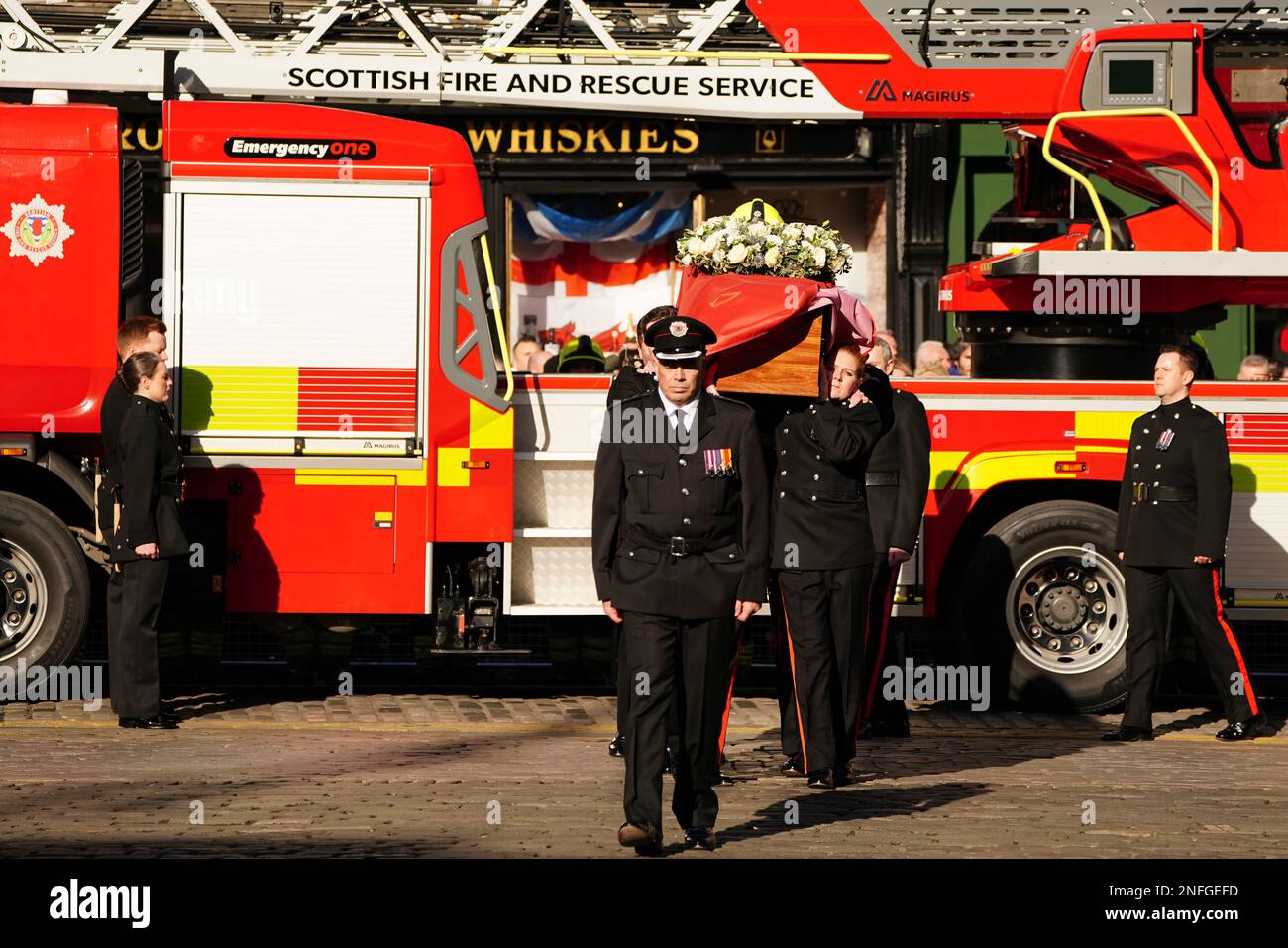 The coffin of Barry Martin is carried into St Giles' Cathedral in ...