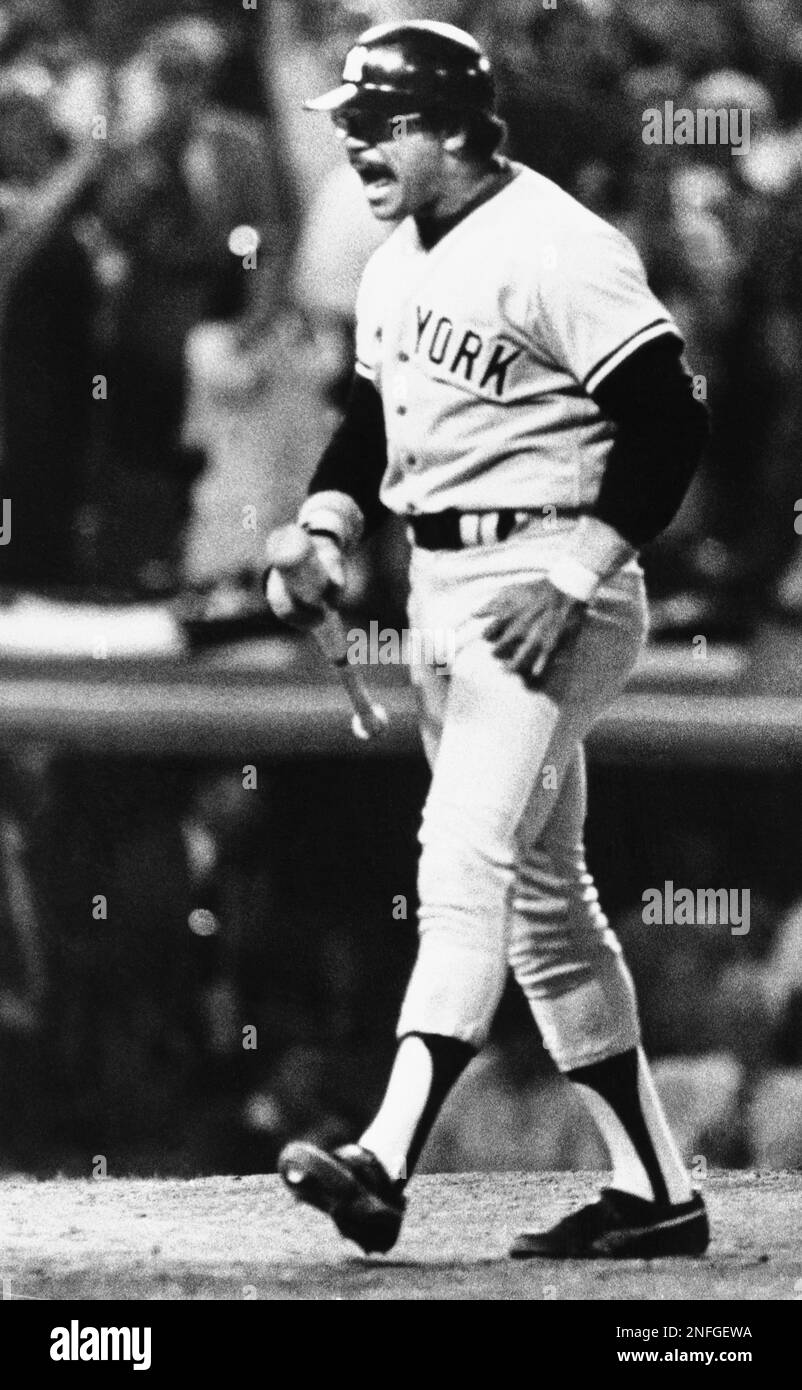 New York Yankees Reggie Jackson talks to himself as he walks away from ...