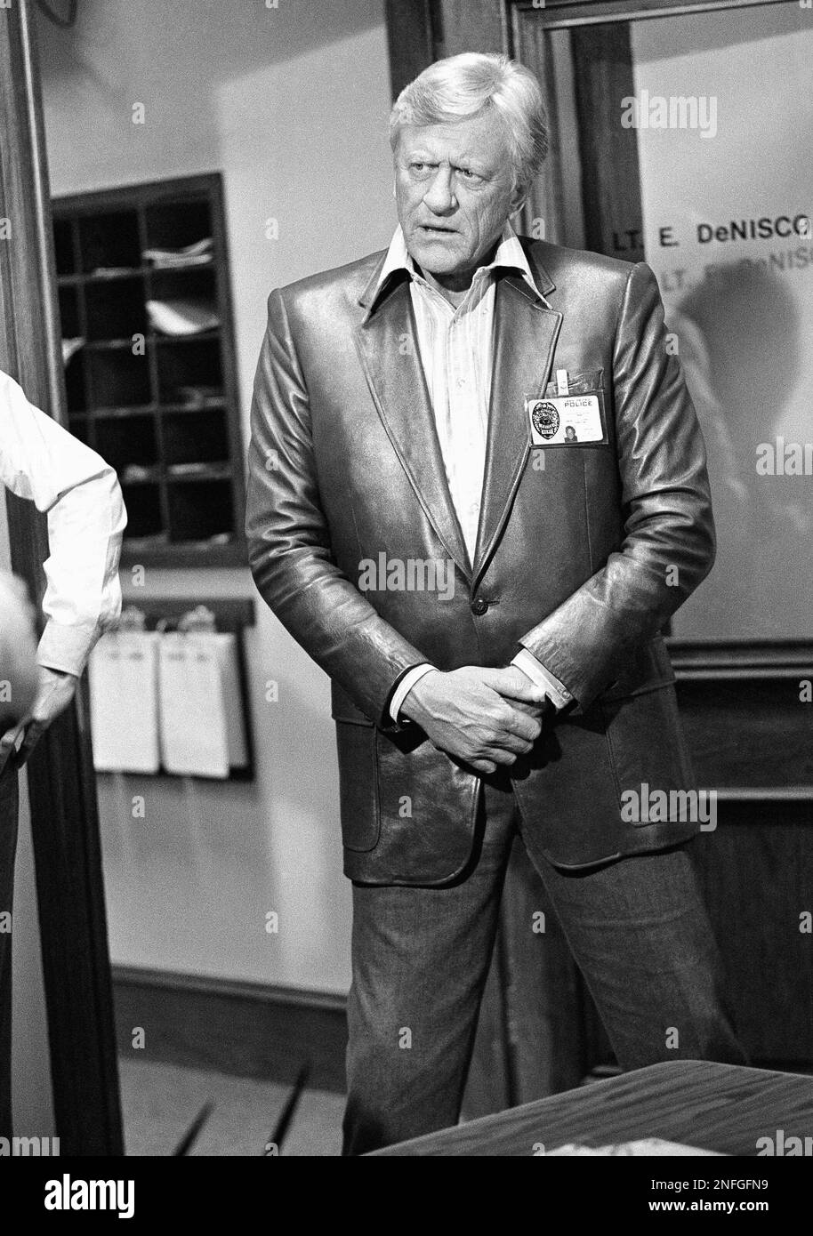 Actor James Arness, shown in character and on set for the title role in ...