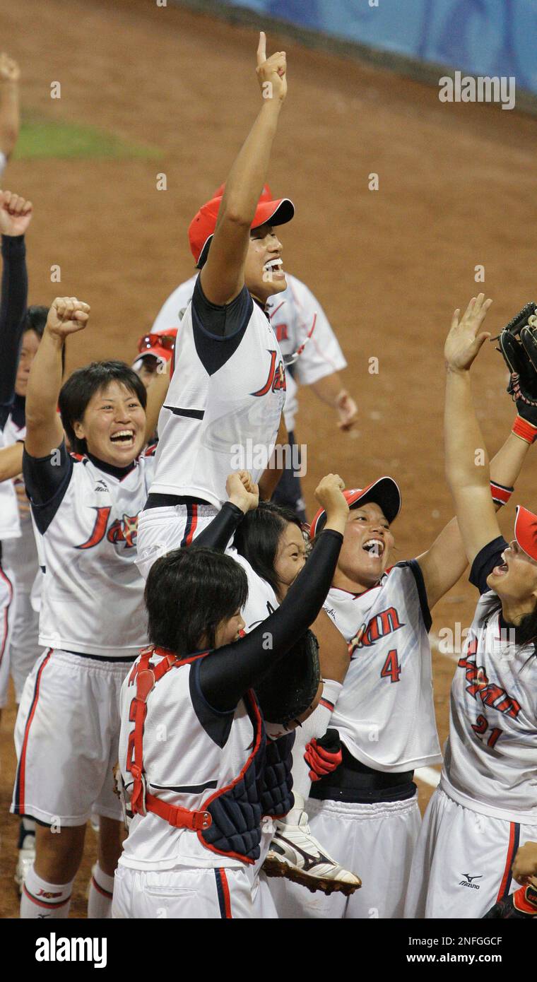 Japan celebrates winning the gold medal against the USA by lifting ...