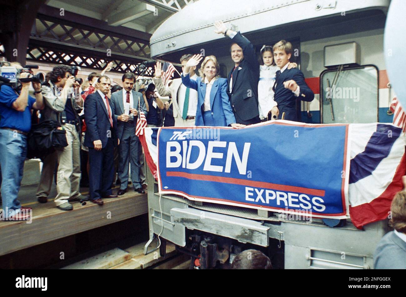 Sen. Joe Biden (D-Del.) waves from his train as he leaves Wilmington ...