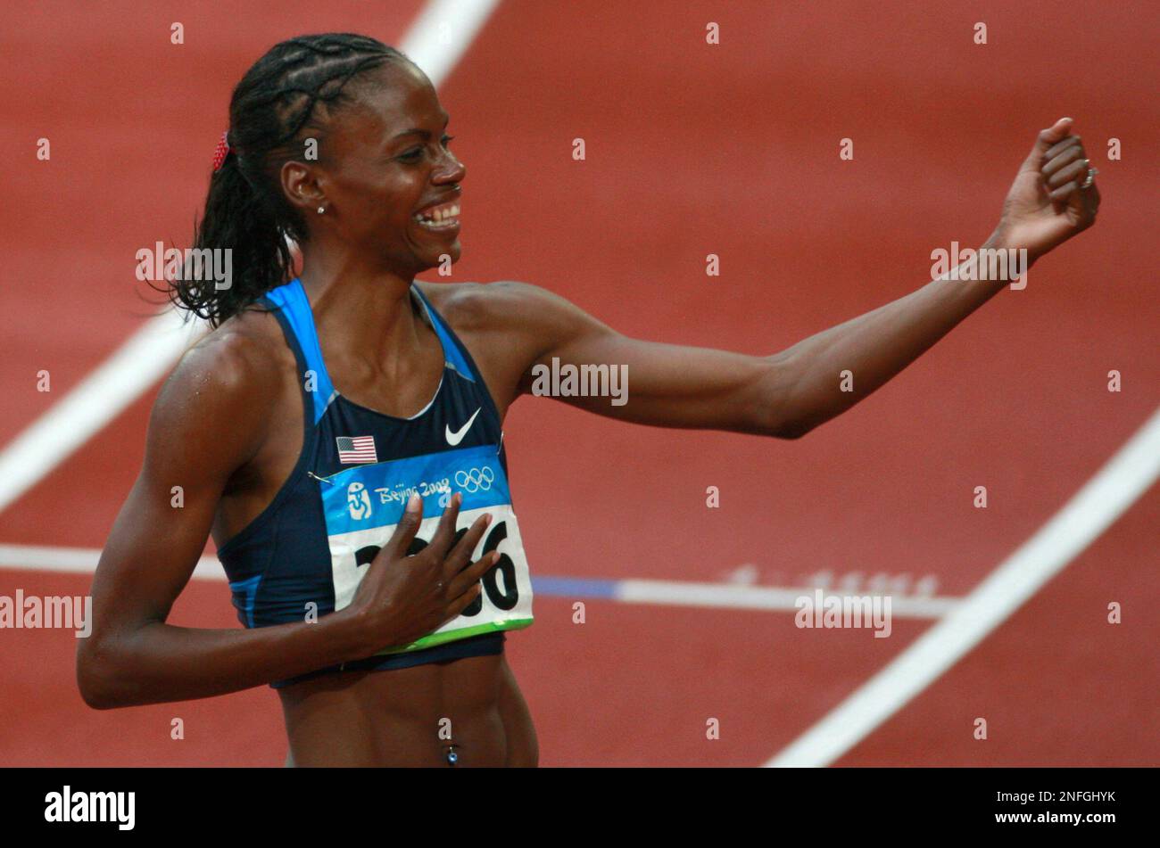 United States' Chaunte Howard reacts as she competes in the women's ...