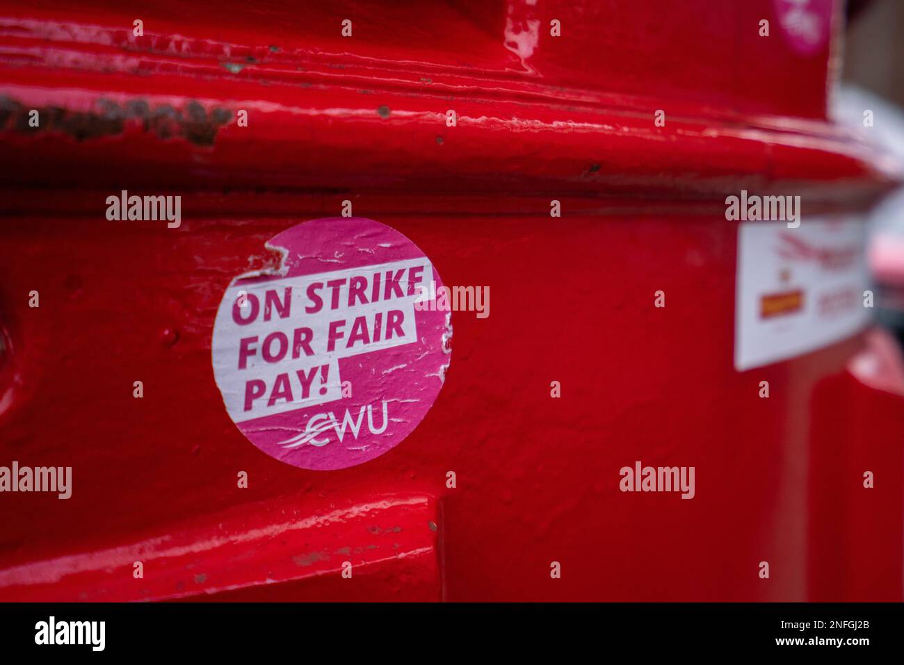 London, UK. 17 February 2023. A sticker by the ( CWU) Communication ...