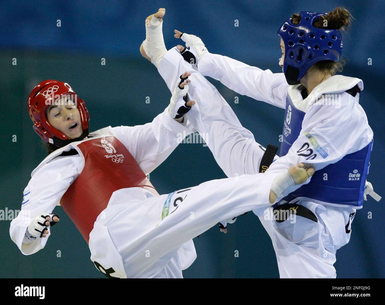 Croatia's Martina Zubcic, in blue, fights Israel's Bat-El Gatterer ...