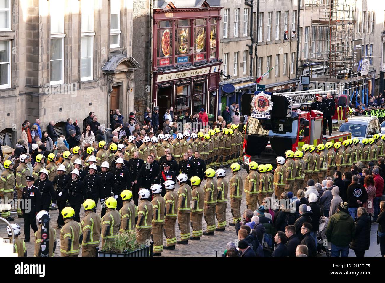 The coffin of Barry Martin arrives on a fire engine outside St Giles ...