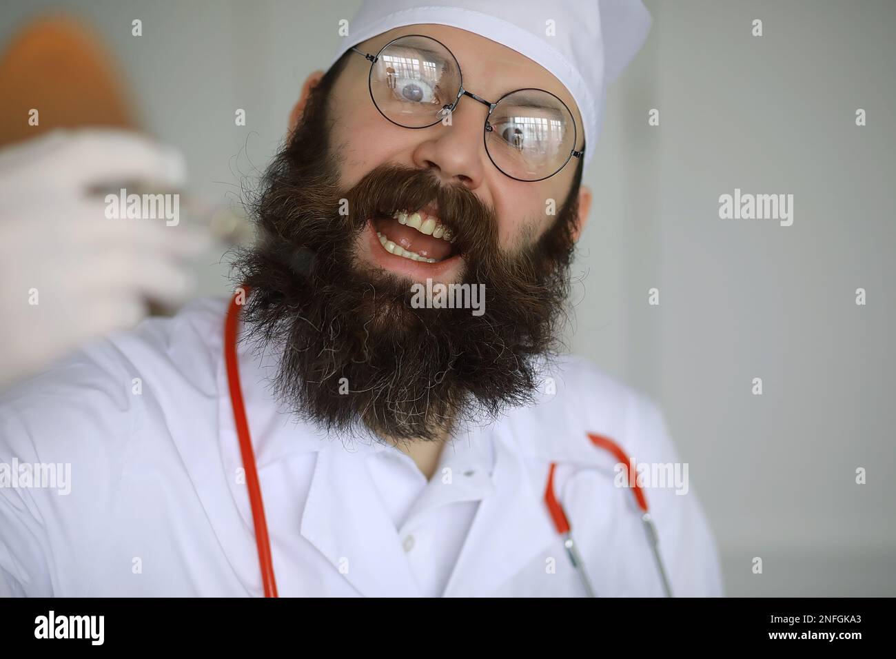 Doctor crazy. Mad beard scientist conducts experiments in a scientific ...