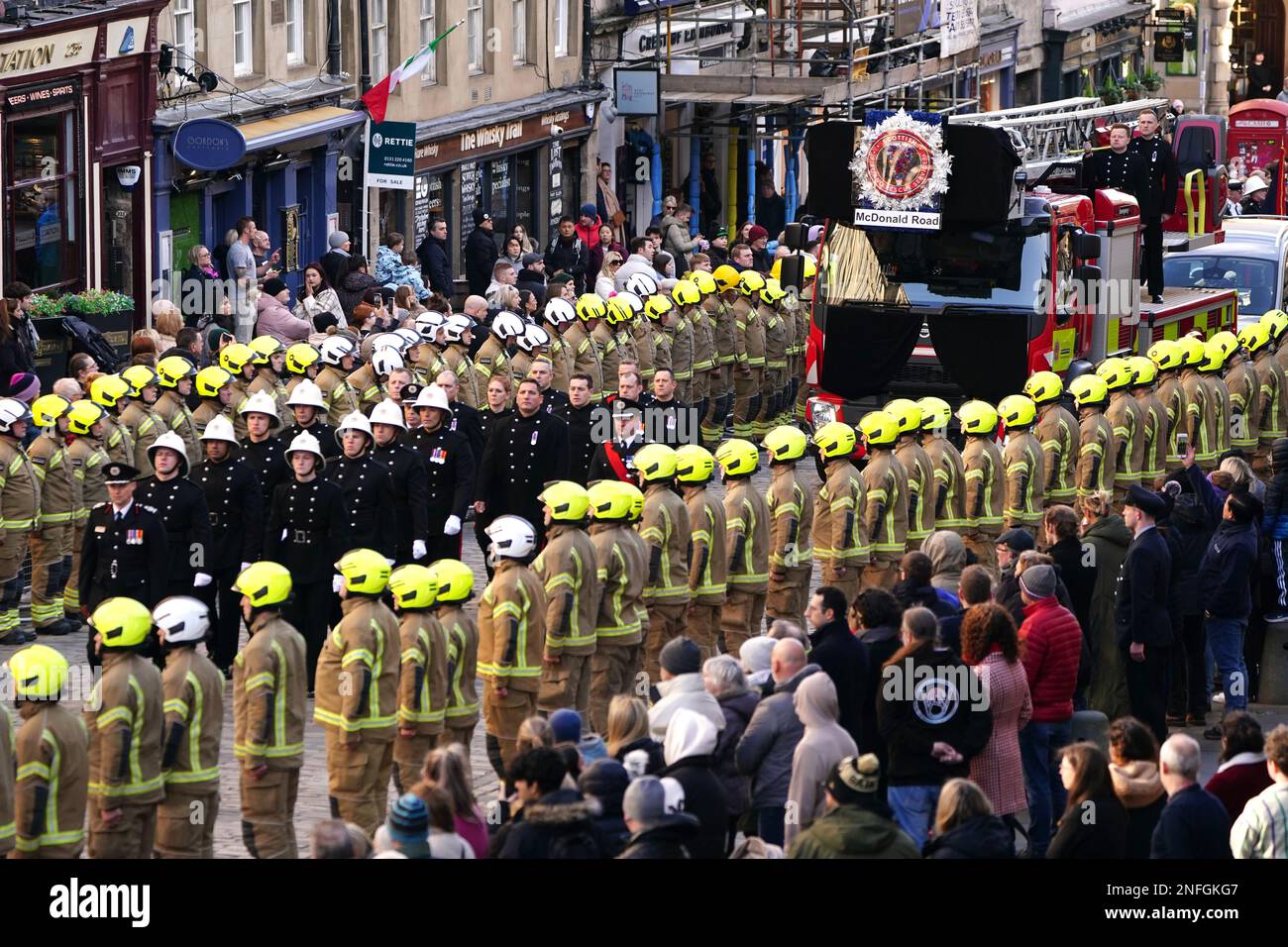 The coffin of Barry Martin arrives on a fire engine outside St Giles ...