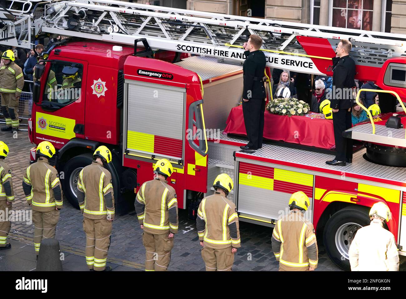 The coffin of Barry Martin arrives on a fire engine outside St Giles ...