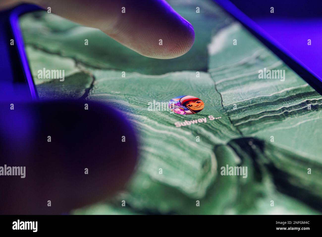 Subway surf game app on smartphone screen. Close up shot of Subway surf ...
