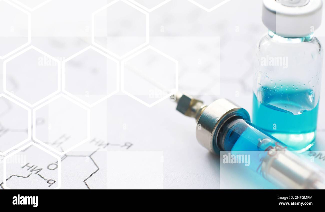 small jars with injection and syringe for injection on blue background ...