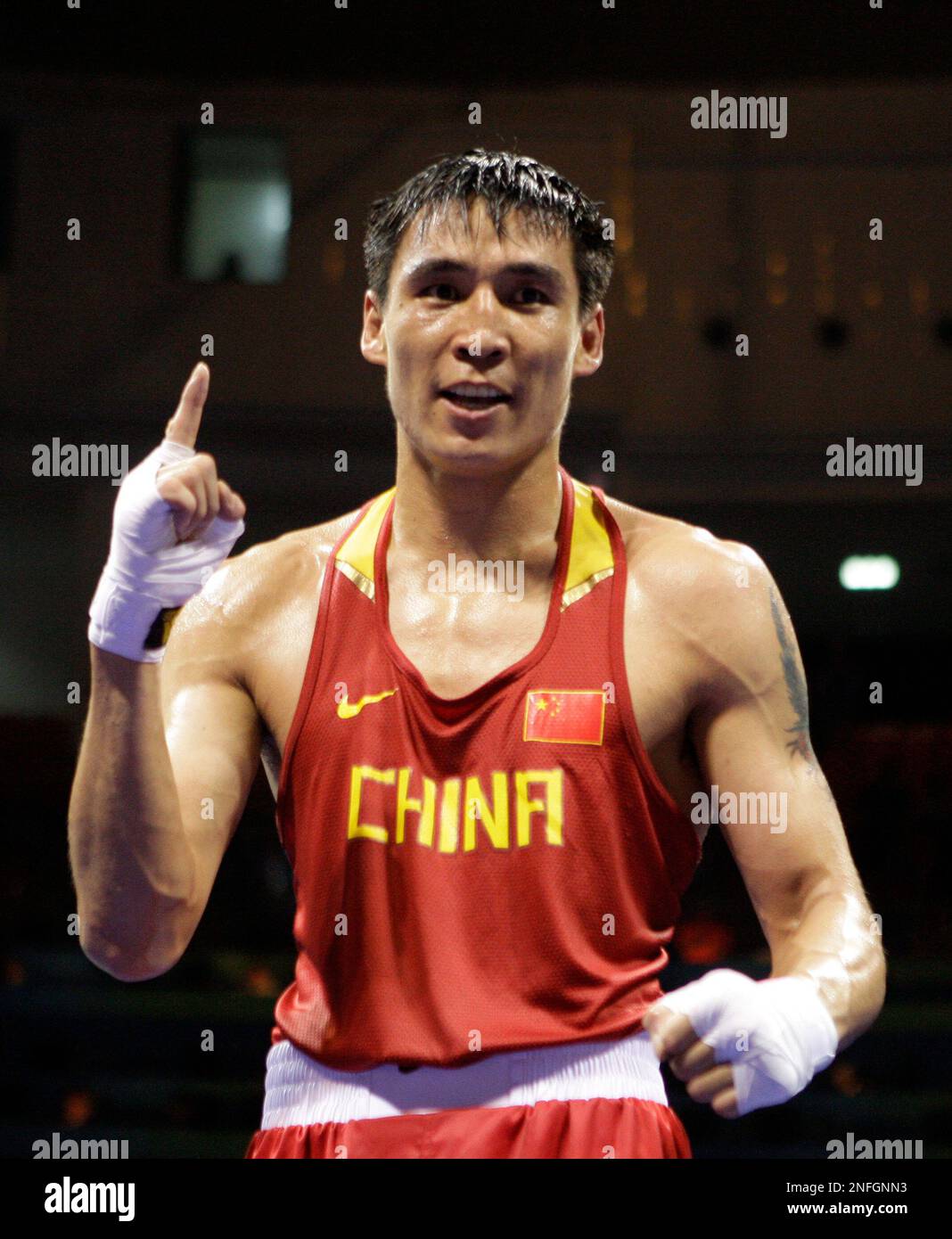 Zhang Xiaoping of China after defeating Abdelhafid Benchabla of Algeria ...