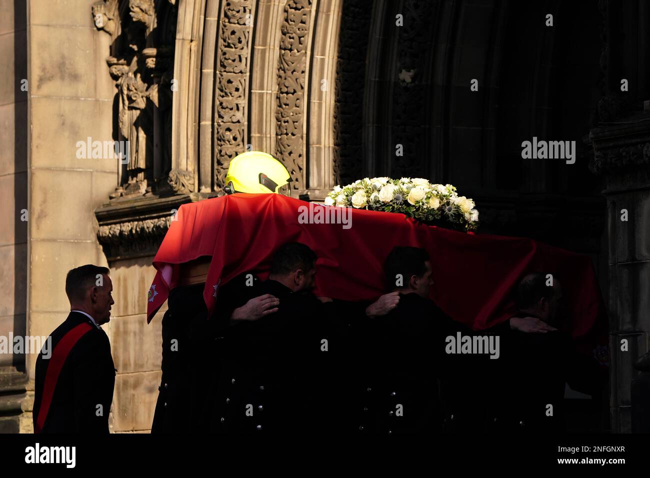 The coffin of Barry Martin is carried into St Giles' Cathedral in ...