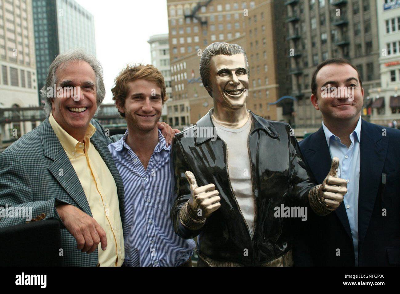 Actor Henry Winkler, left, poses with his sons Max Winkler, second left ...