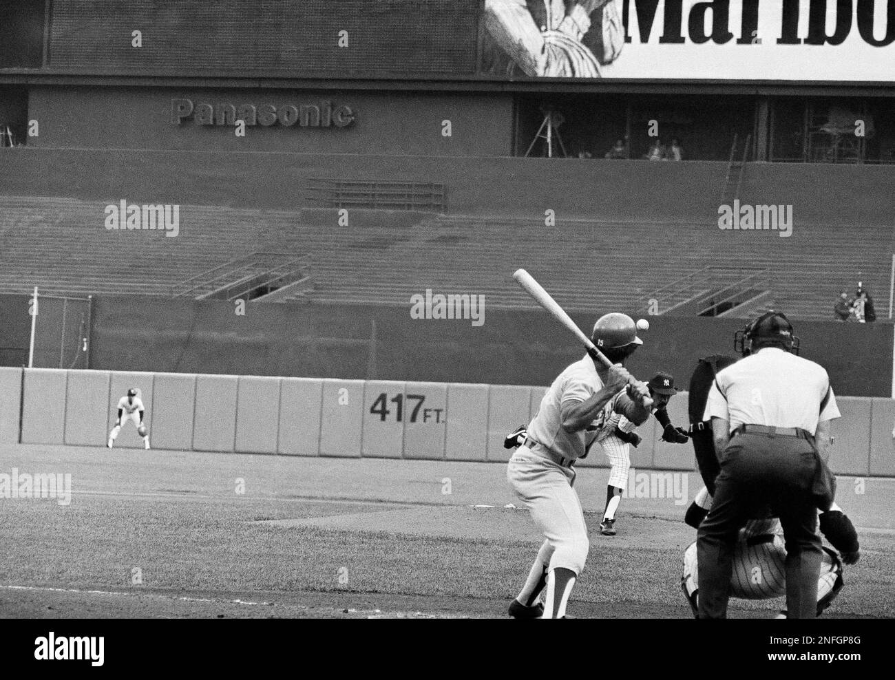 New York Yankees pitcher Ed Figueroa delivers first pitch "a strike' to ...