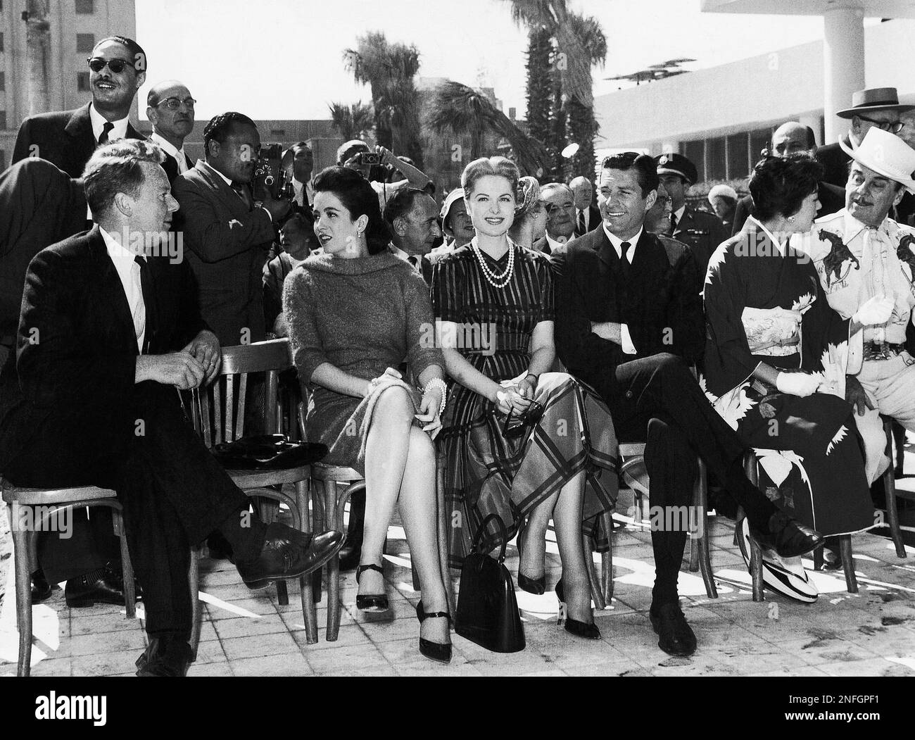 Hollywood screen actors are shown on the terrace of the New Nile-Hilton ...