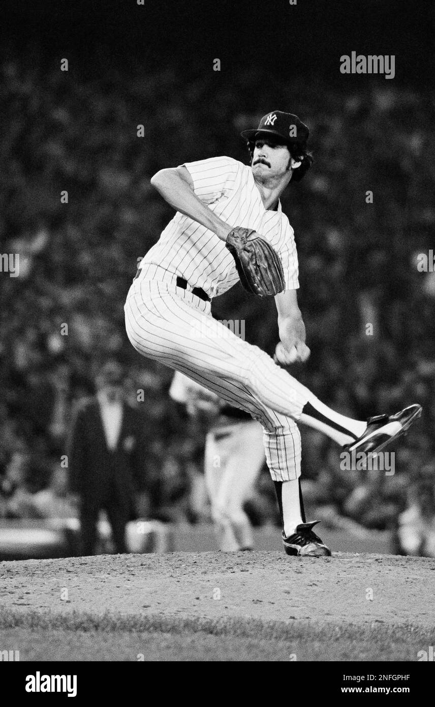 New York Yankees pitcher Ron Guidry shows his form as he fires pitch ...