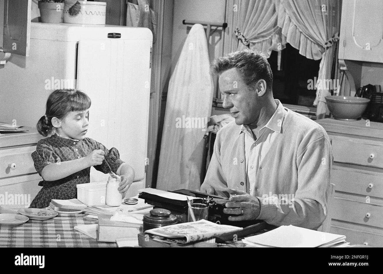 Actor Van Johnson, pictured on the set of "Wives and Lovers" with child actress Claire Wilcox ...