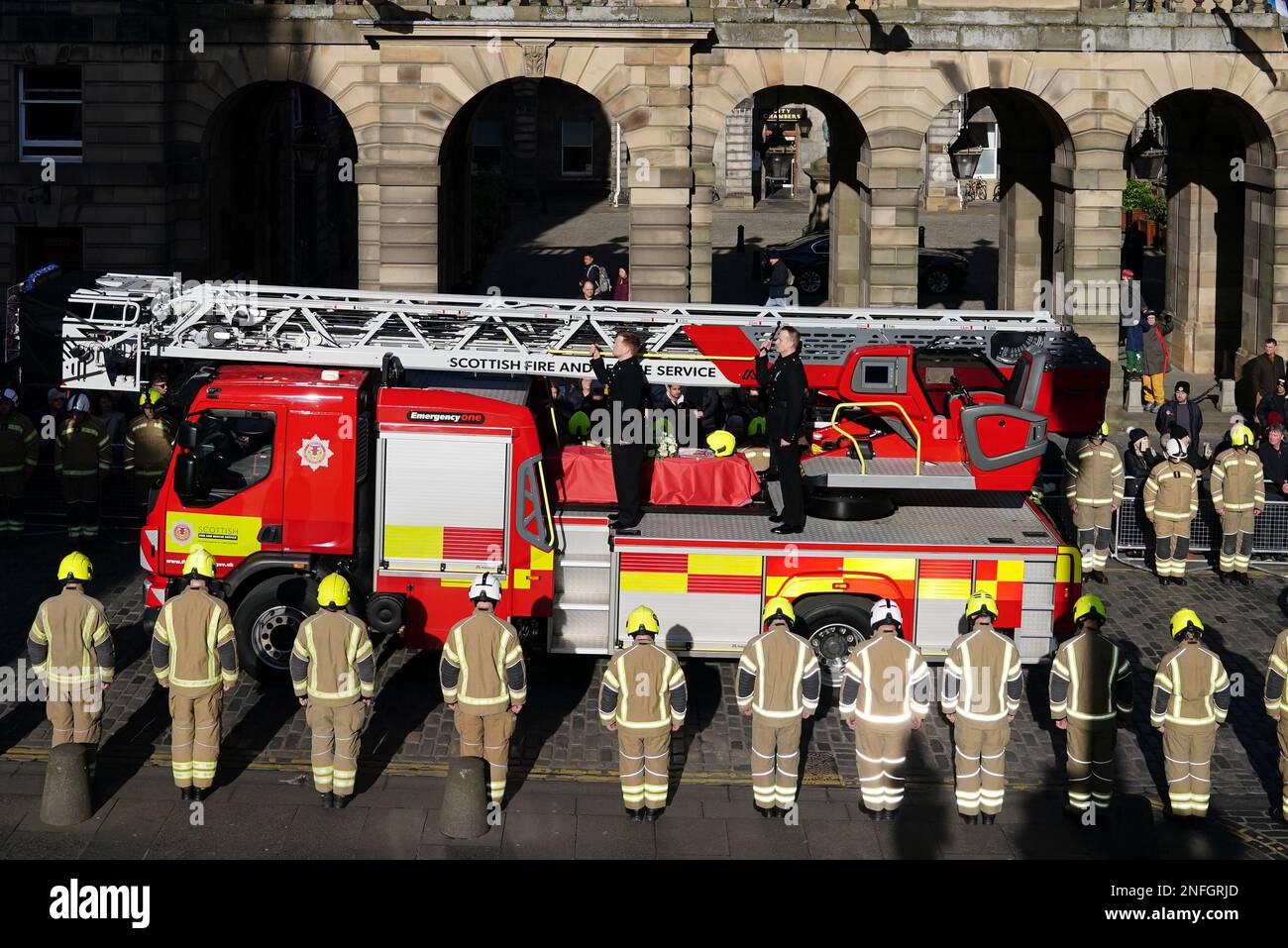 The coffin of Barry Martin arrives on a fire engine outside St Giles ...