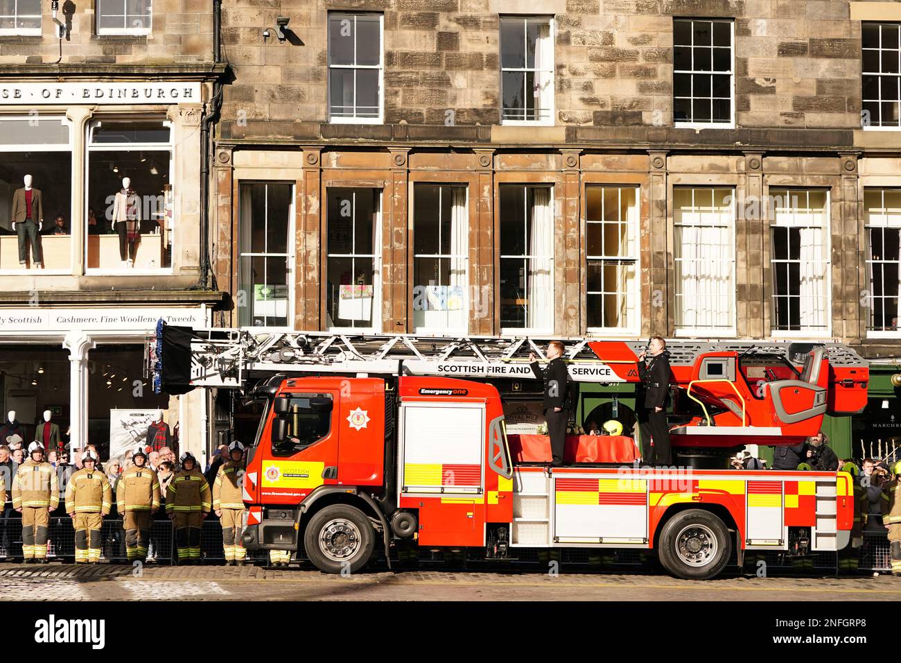 The coffin of Barry Martin arrives on a fire engine outside St Giles ...