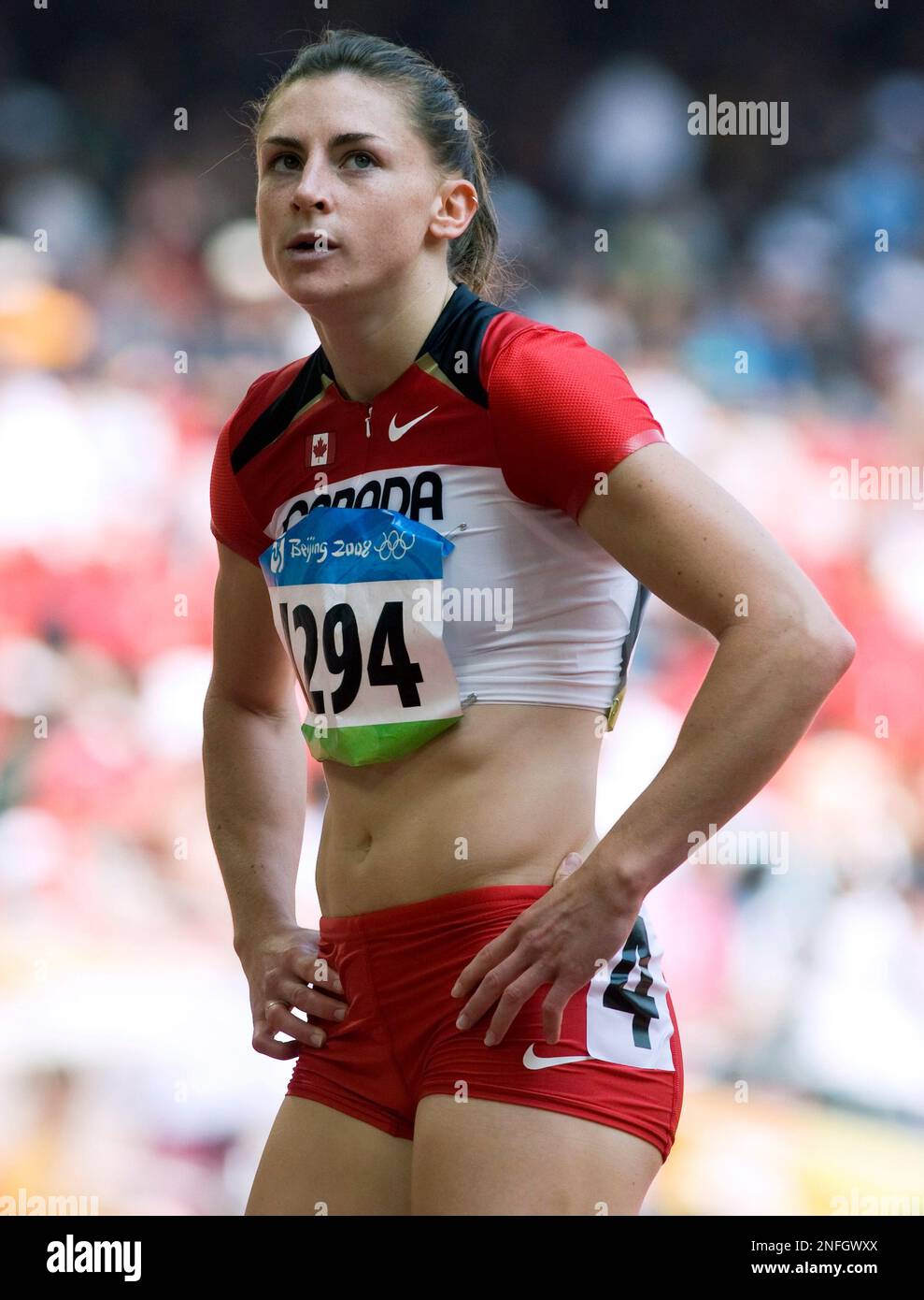 Canada's Adrienne Power, from Halifax, watches the scoreboard after ...
